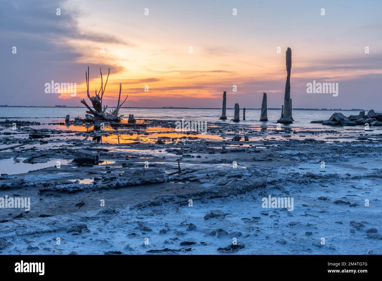 A view of a muddy coast before the seascape at a beautiful sunset Stock ...
