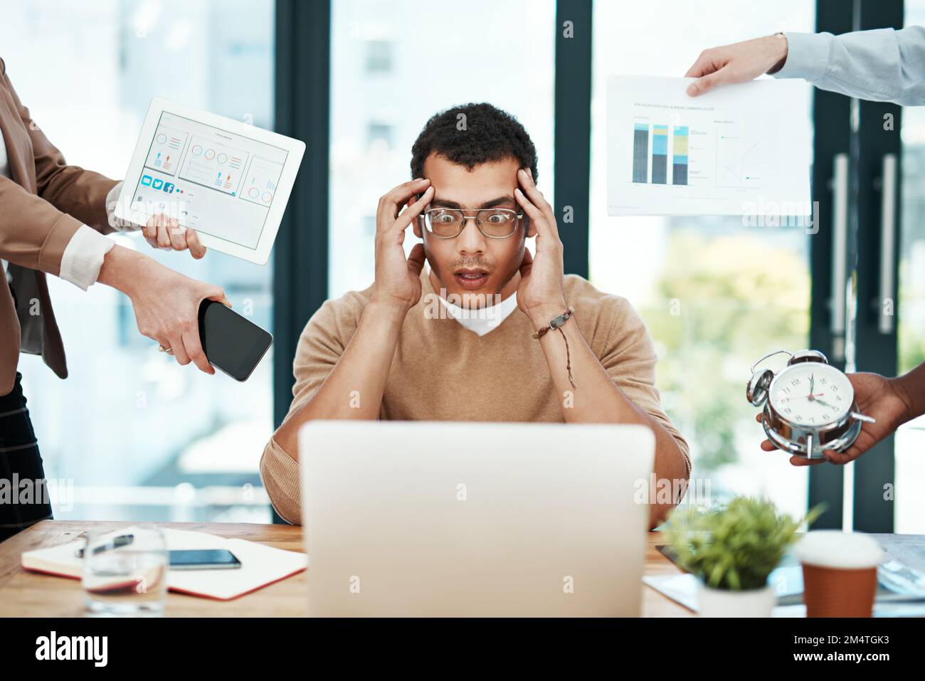 This is not what I signed up for. a young businessman looking stressed ...