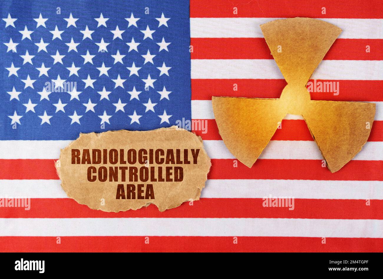 Industry and radiation concept. On the flag of the United States, there ...