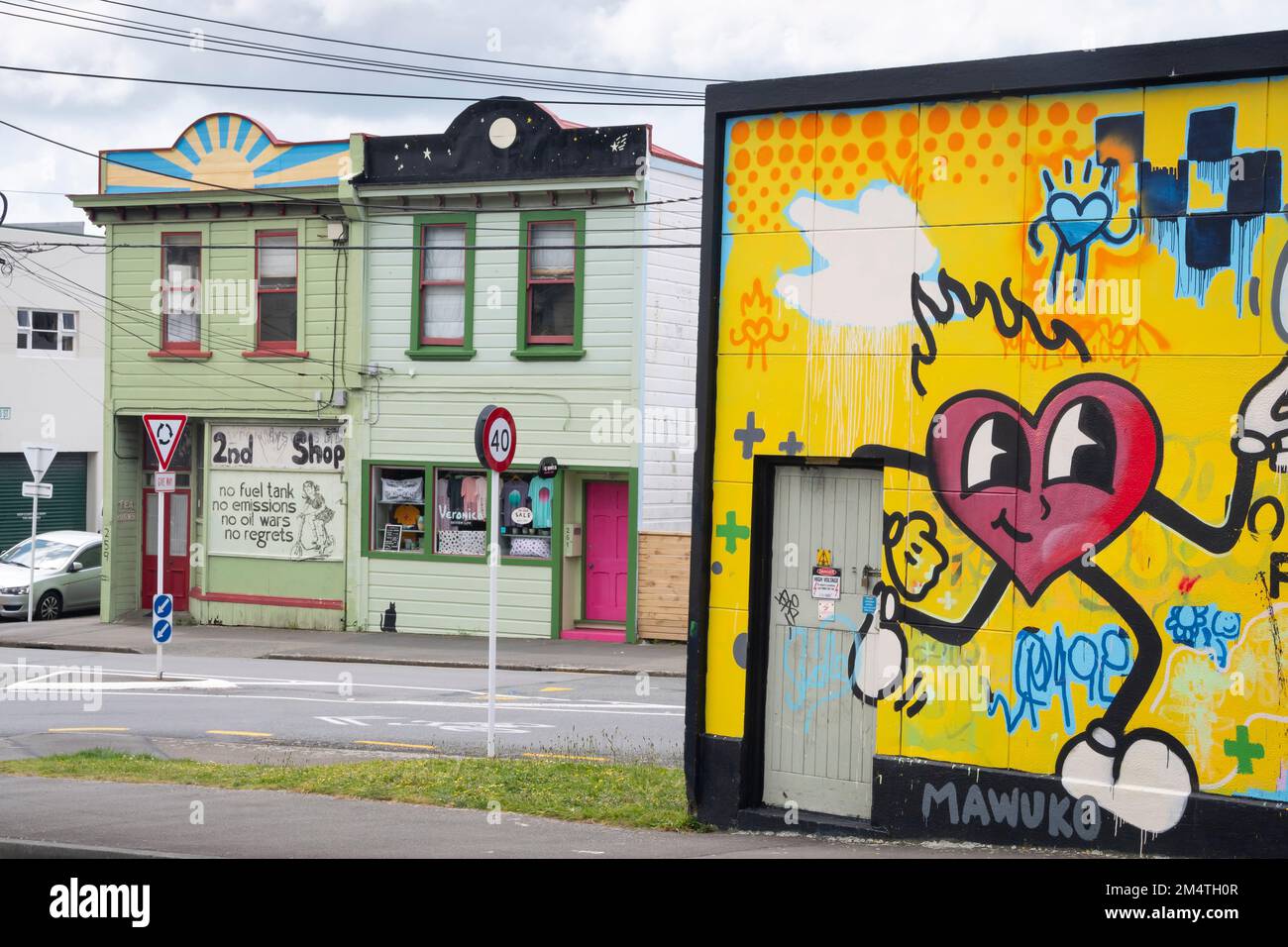 Old commercial building facades and graffitied wall, Newtown ...