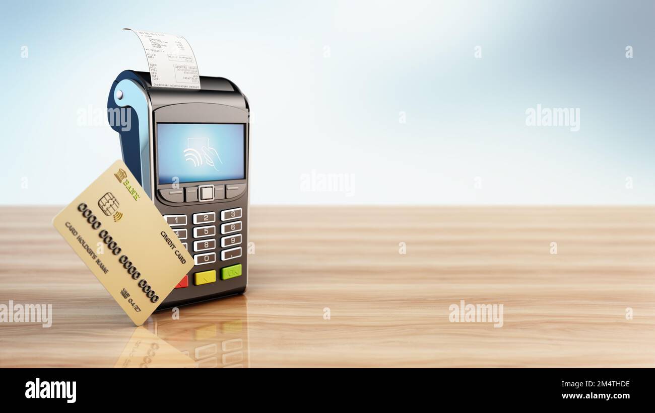 POS machine and credit card standing on wooden table. Copy space on the ...