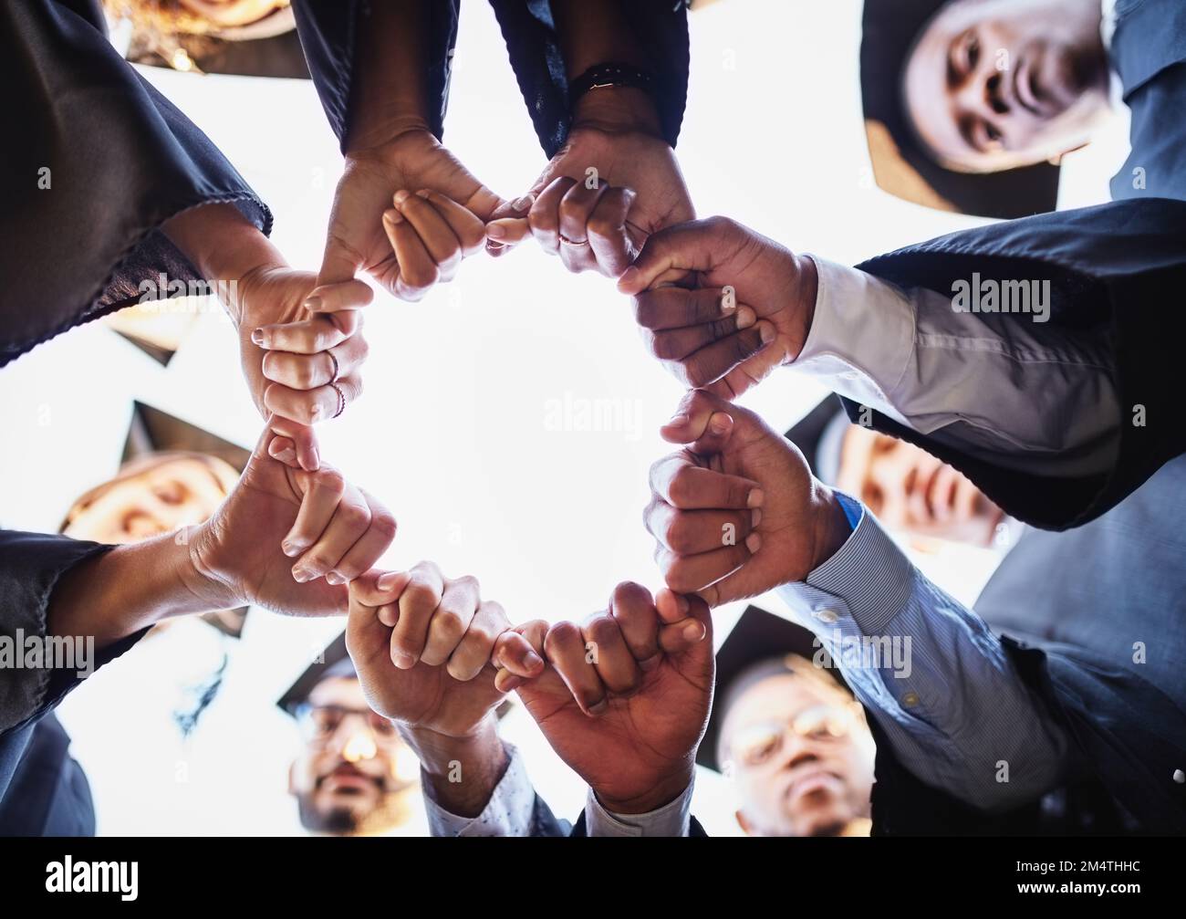 Believe and youll succeed. Low angle shot of a group of young students ...