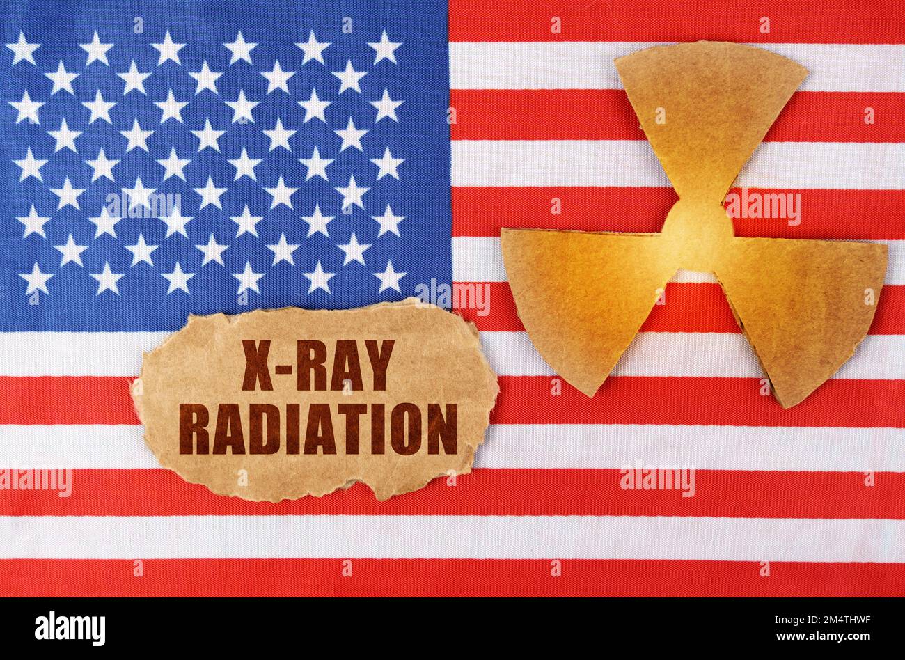 Industry and radiation concept. On the flag of the United States, there ...