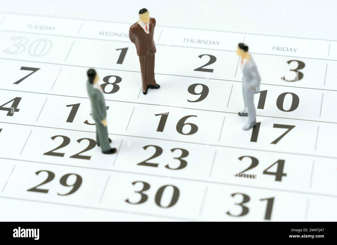 Business and finance concept. There are miniature figures of ...