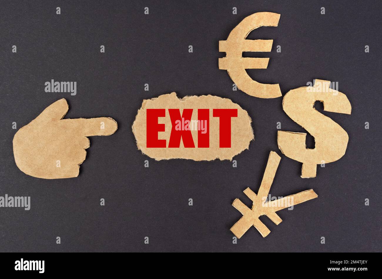 Economy and finance concept. On a black surface, a figure of a hand ...