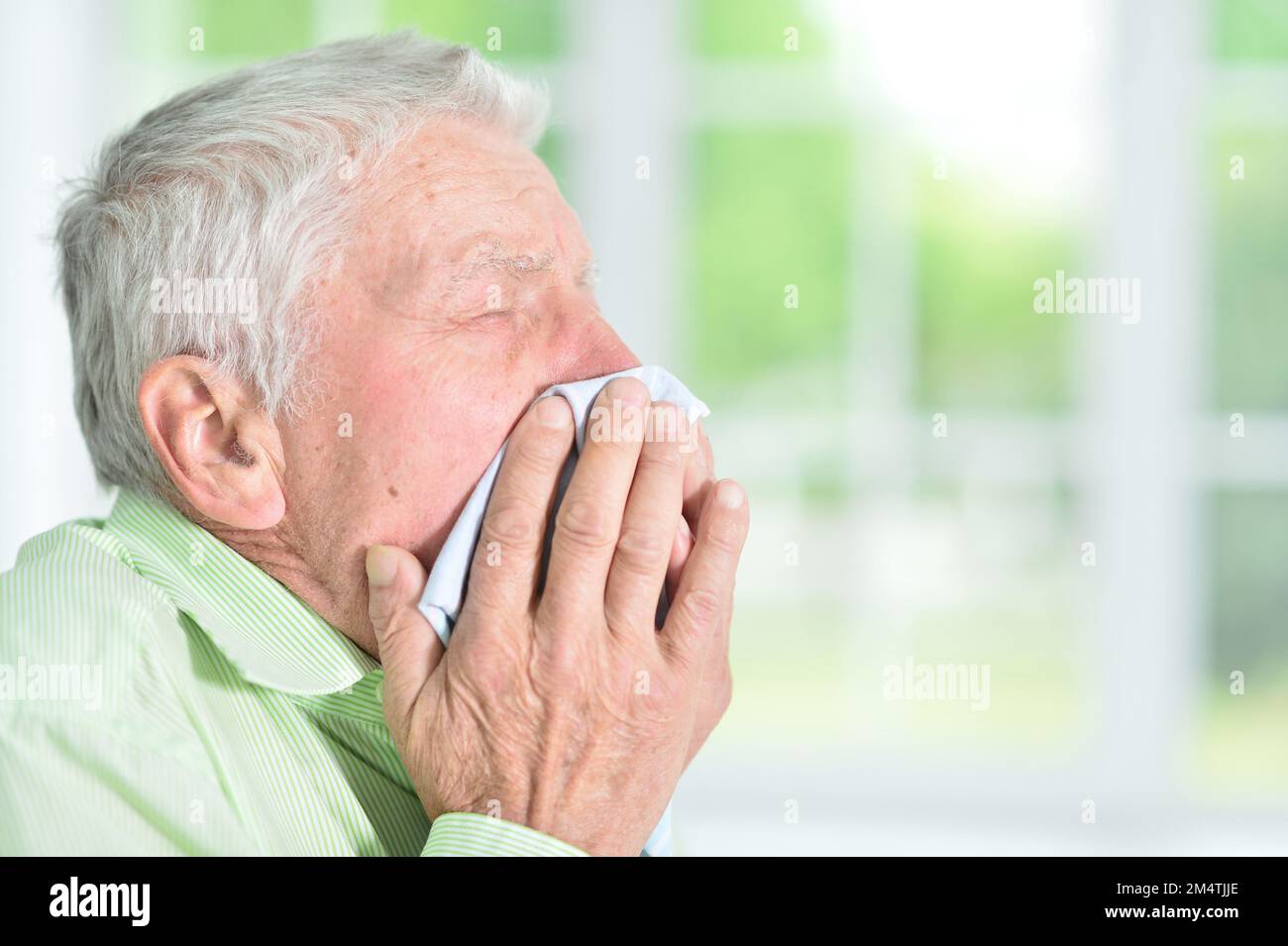 Portrait of sad sick old man at home Stock Photo - Alamy