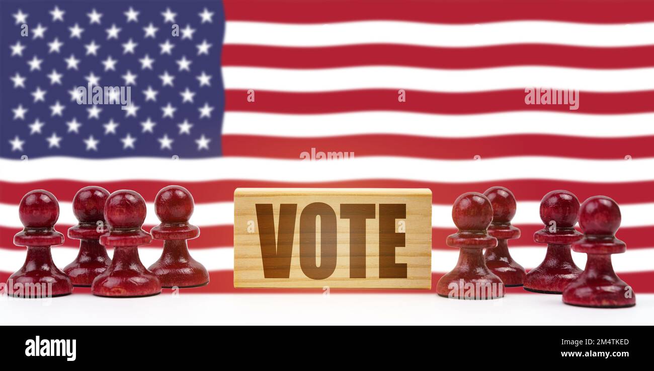 national concept. Against the background of the US flag pawns and a ...