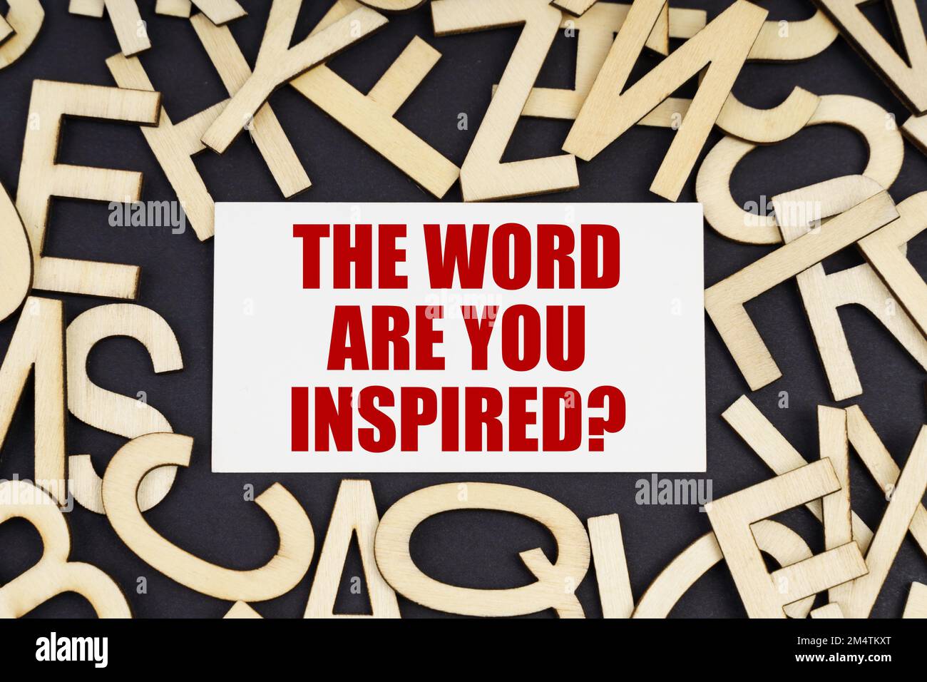 Finance and economy concept. On a black surface are wooden letters and ...