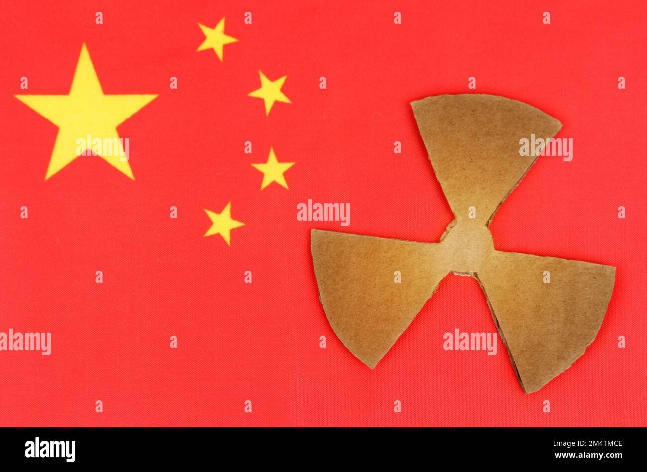 The concept of industry and radiation. The flag of China has a symbol ...