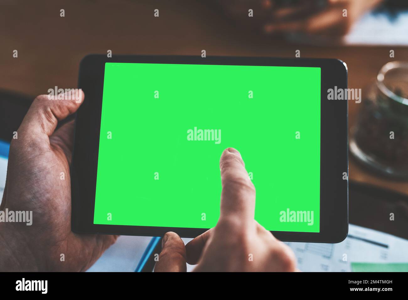 Accessing information is as easy as one, two, tap. a businessman using ...