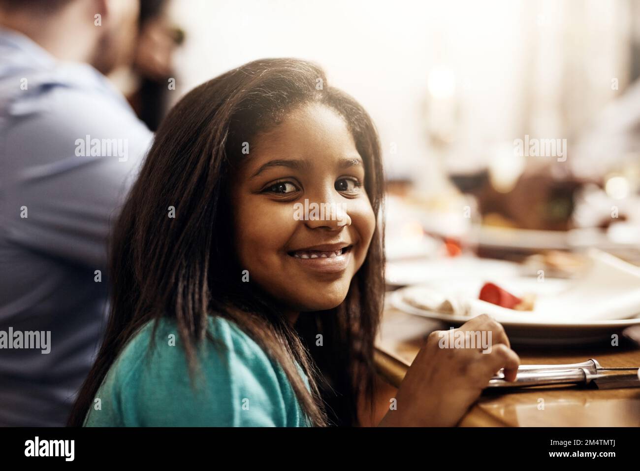 I cant wait to eat. Portrait of an adorable little girl enjoying ...