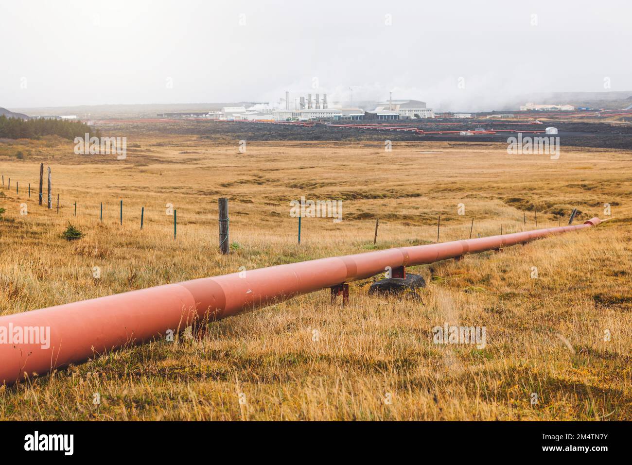 Hot water running to and from the geothermal power plant in large red ...