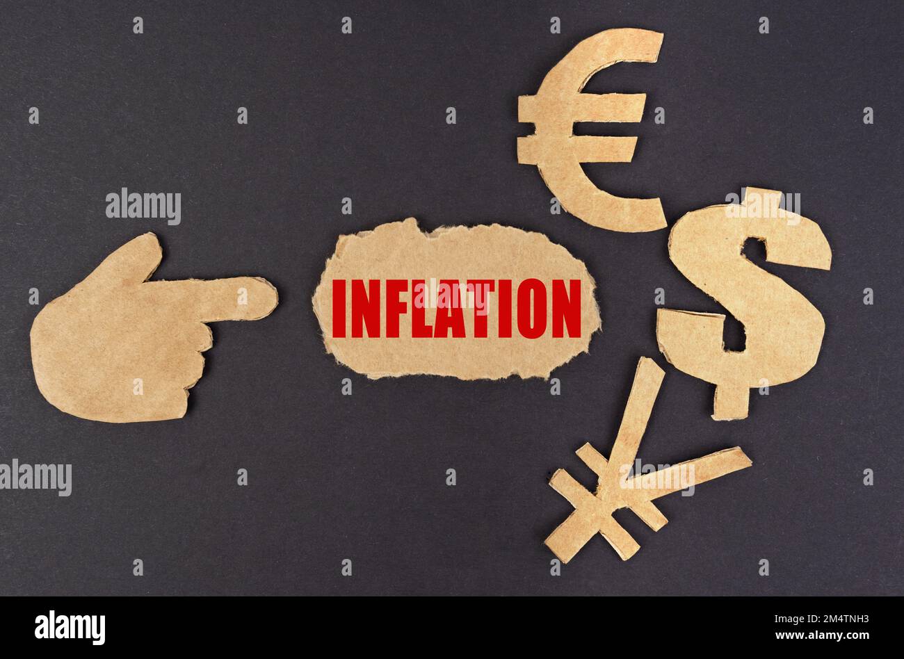 Economy and finance concept. On a black surface, a figure of a hand ...