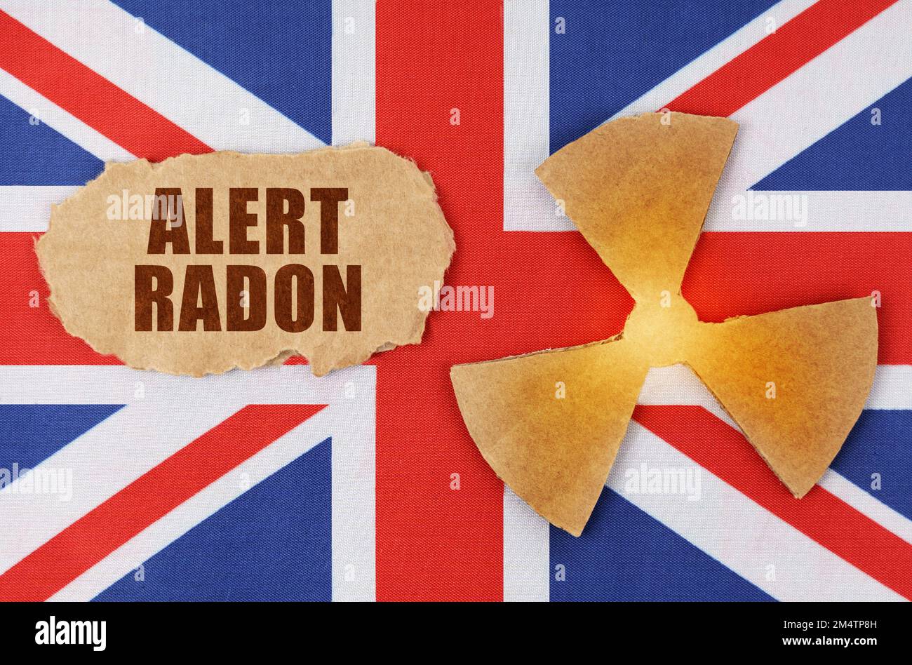 Industry and radiation concept. On the flag of Great Britain, there is ...