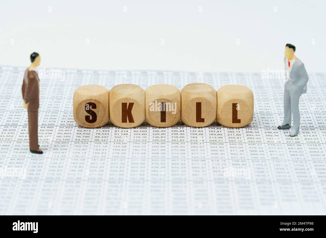 Business and finance concept. On financial reports there are figures of ...