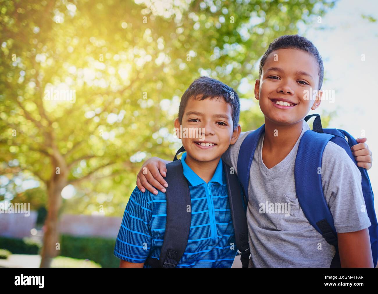 Best buddies for life. two adorable young boys outside Stock Photo - Alamy