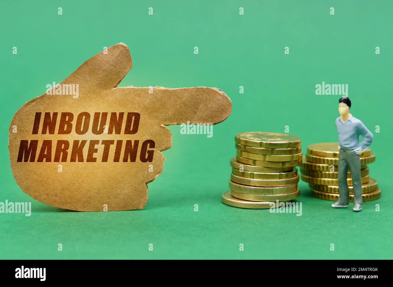Business and economy concept. On the green surface of the coin and a ...