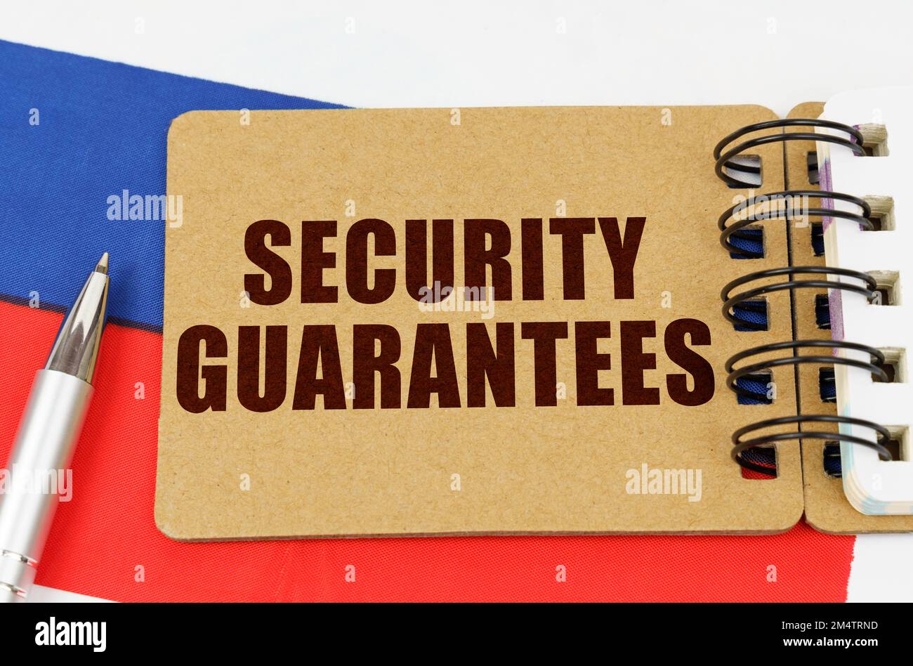 national concept. On the flag of Russia lies a pen and a notepad with ...