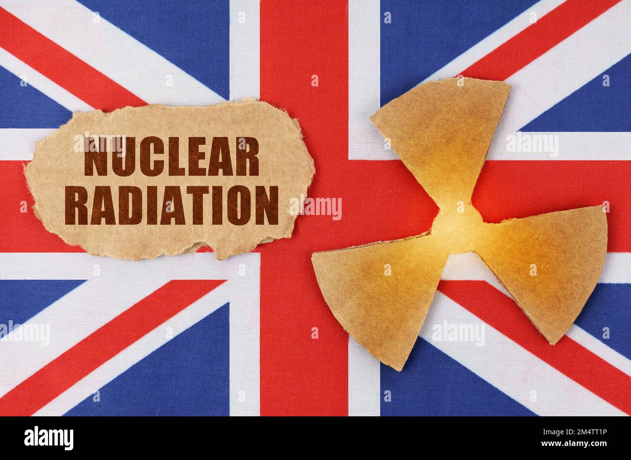 Industry and radiation concept. On the flag of Great Britain, there is ...
