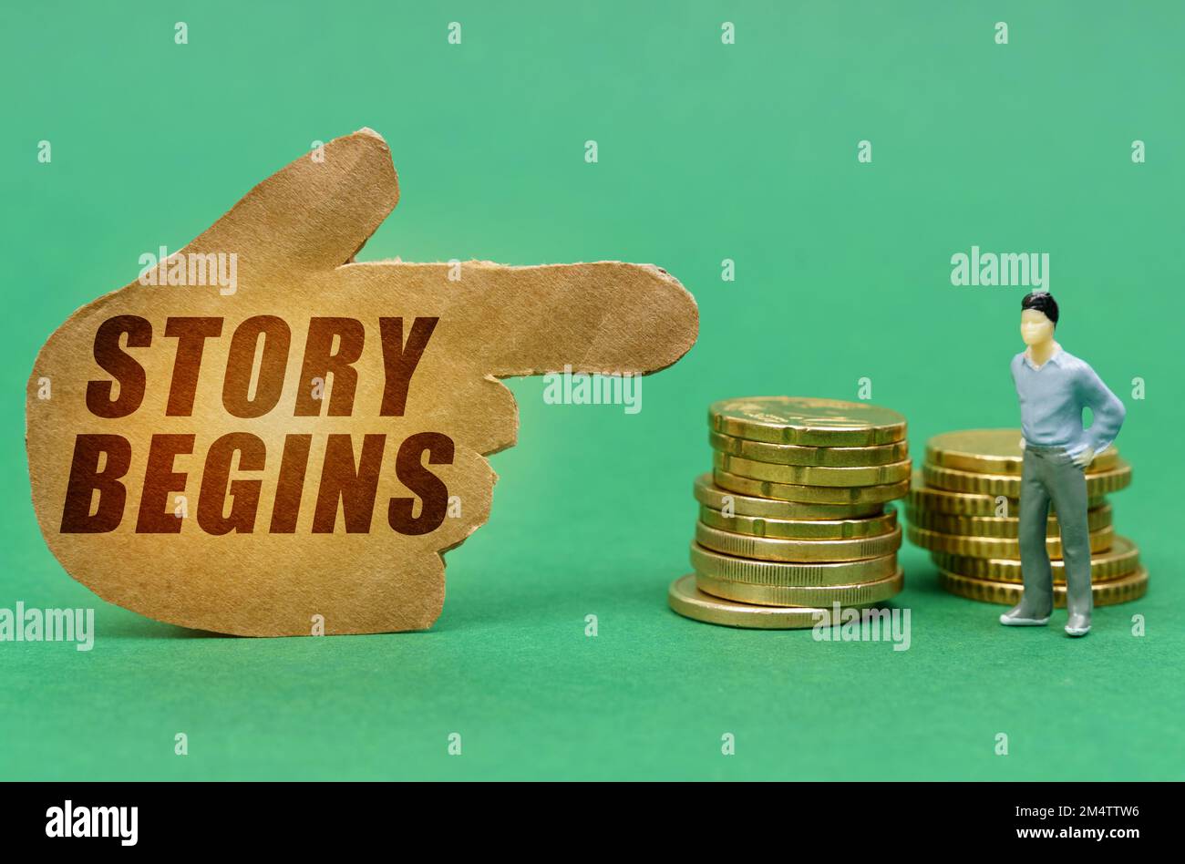 Business and economy concept. On the green surface of the coin and a ...