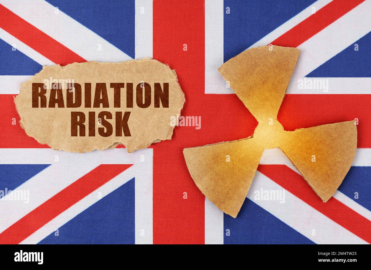 Industry and radiation concept. On the flag of Great Britain, there is ...
