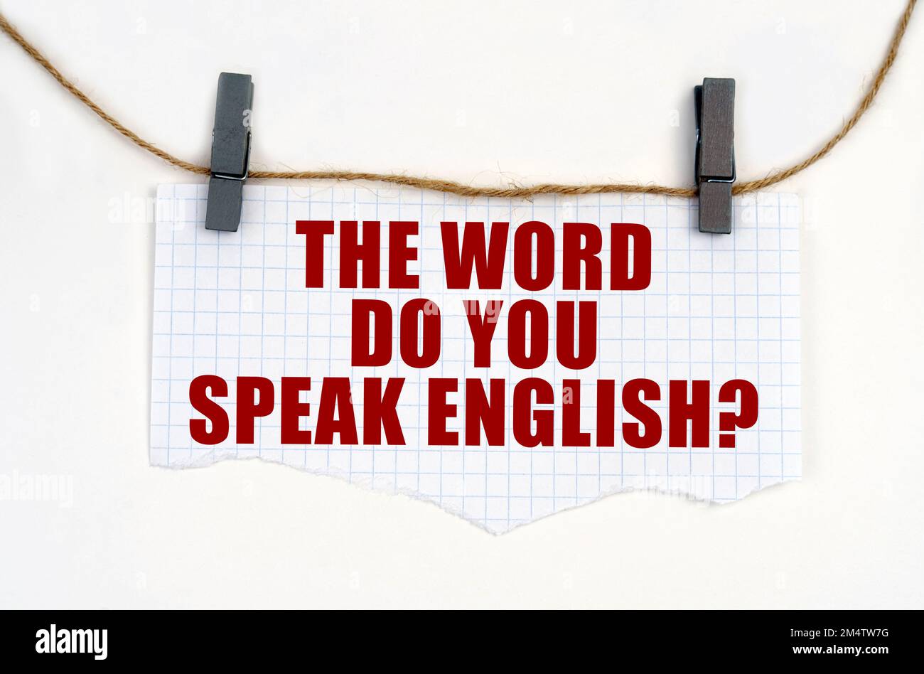 Education concept. A sheet of paper with the inscription is attached to the rope with ...