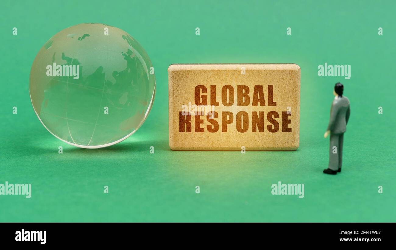 Technology and business concept. On the green surface is a globe and a ...