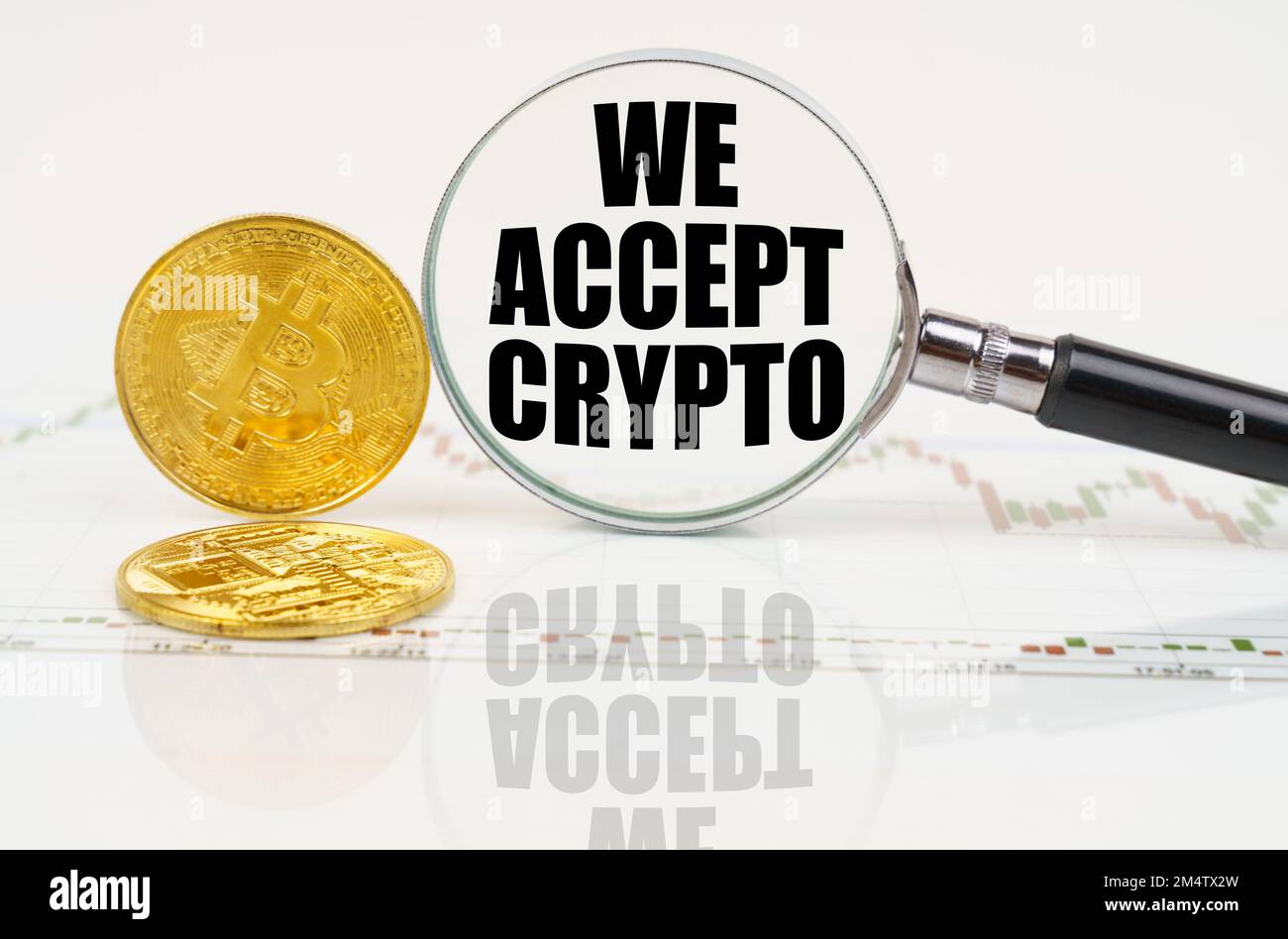 Business and technology concept. There are bitcoins on the chart and ...