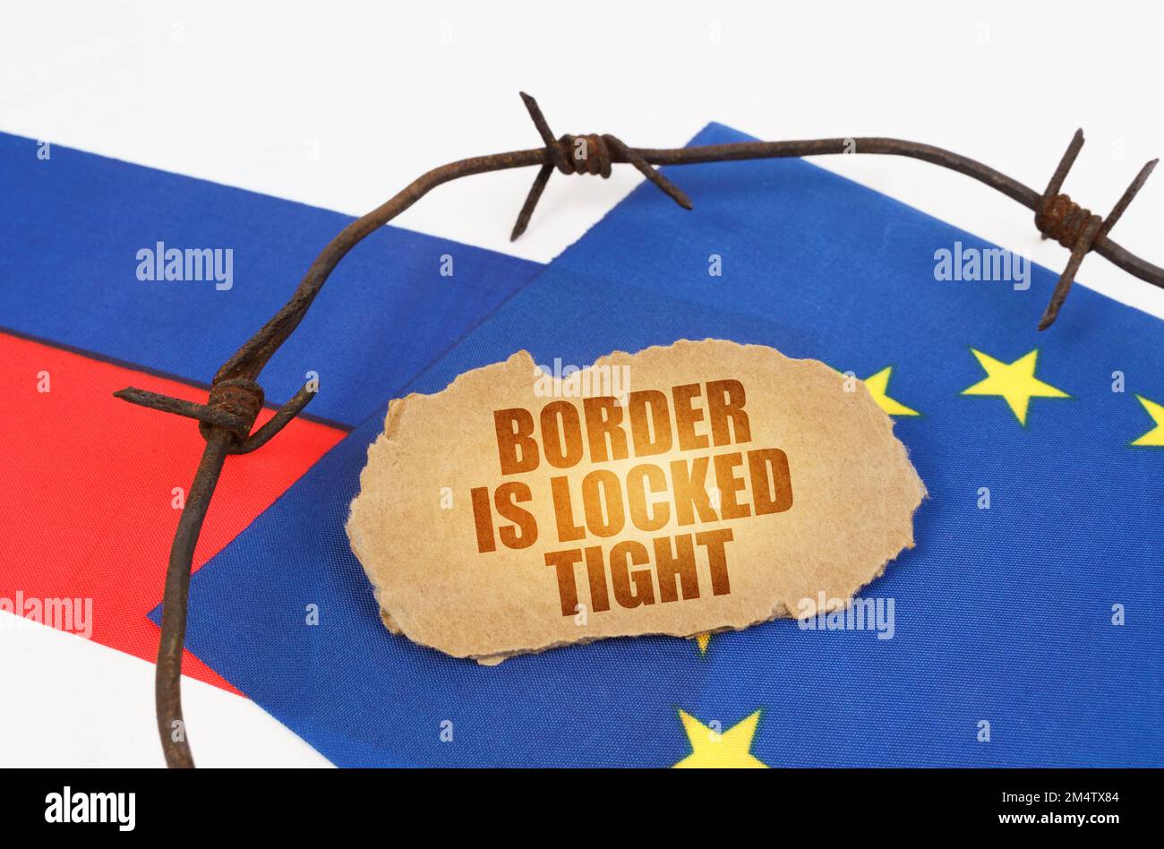 Political concept. On the flags of the European Union and Russia lies a ...