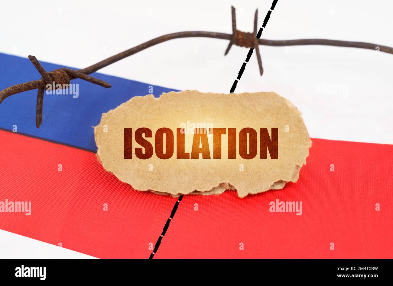 Political concept. On the flags of Poland and Russia lies a cardboard ...