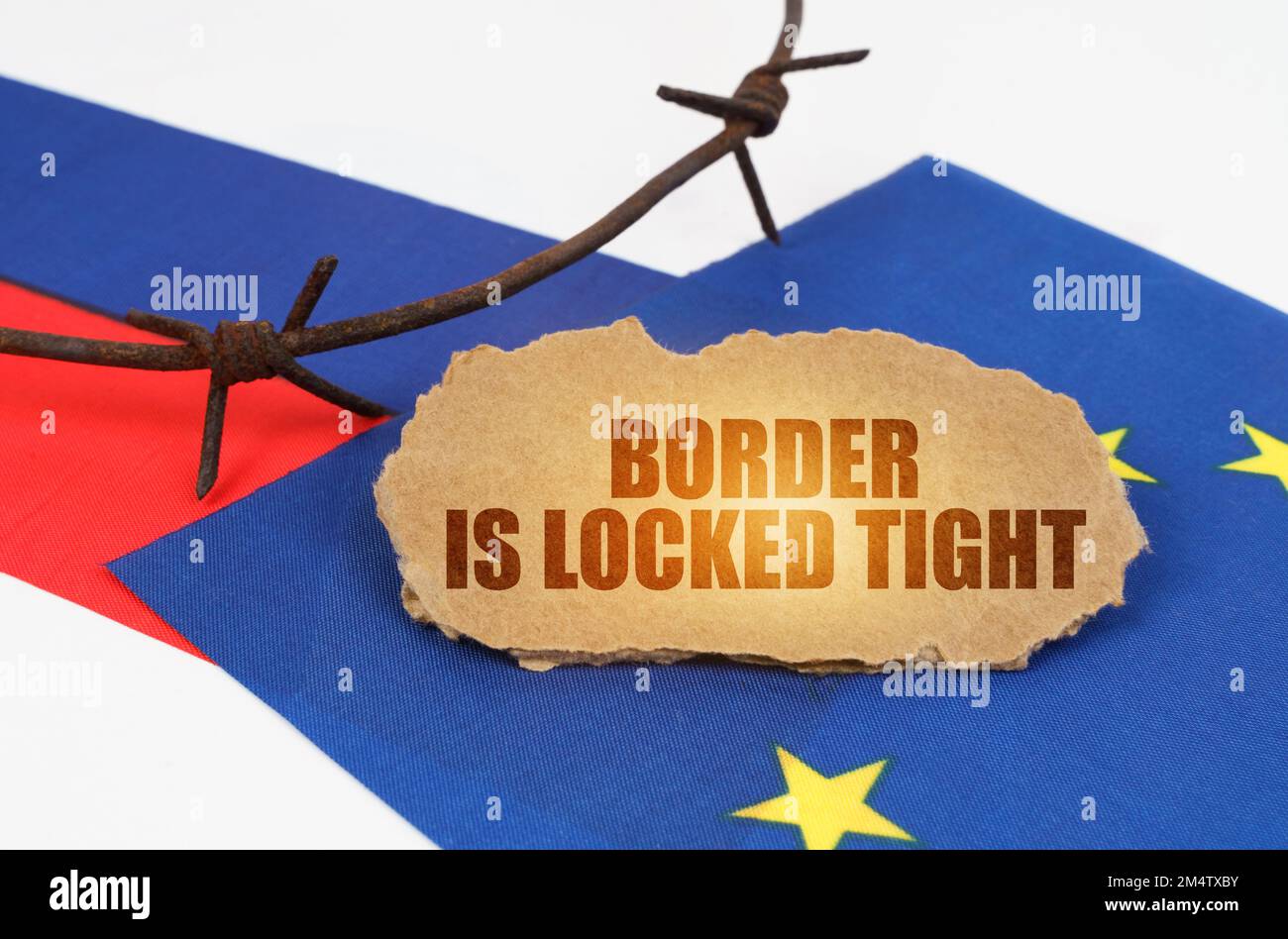 Political concept. On the flags of the European Union and Russia lies a ...