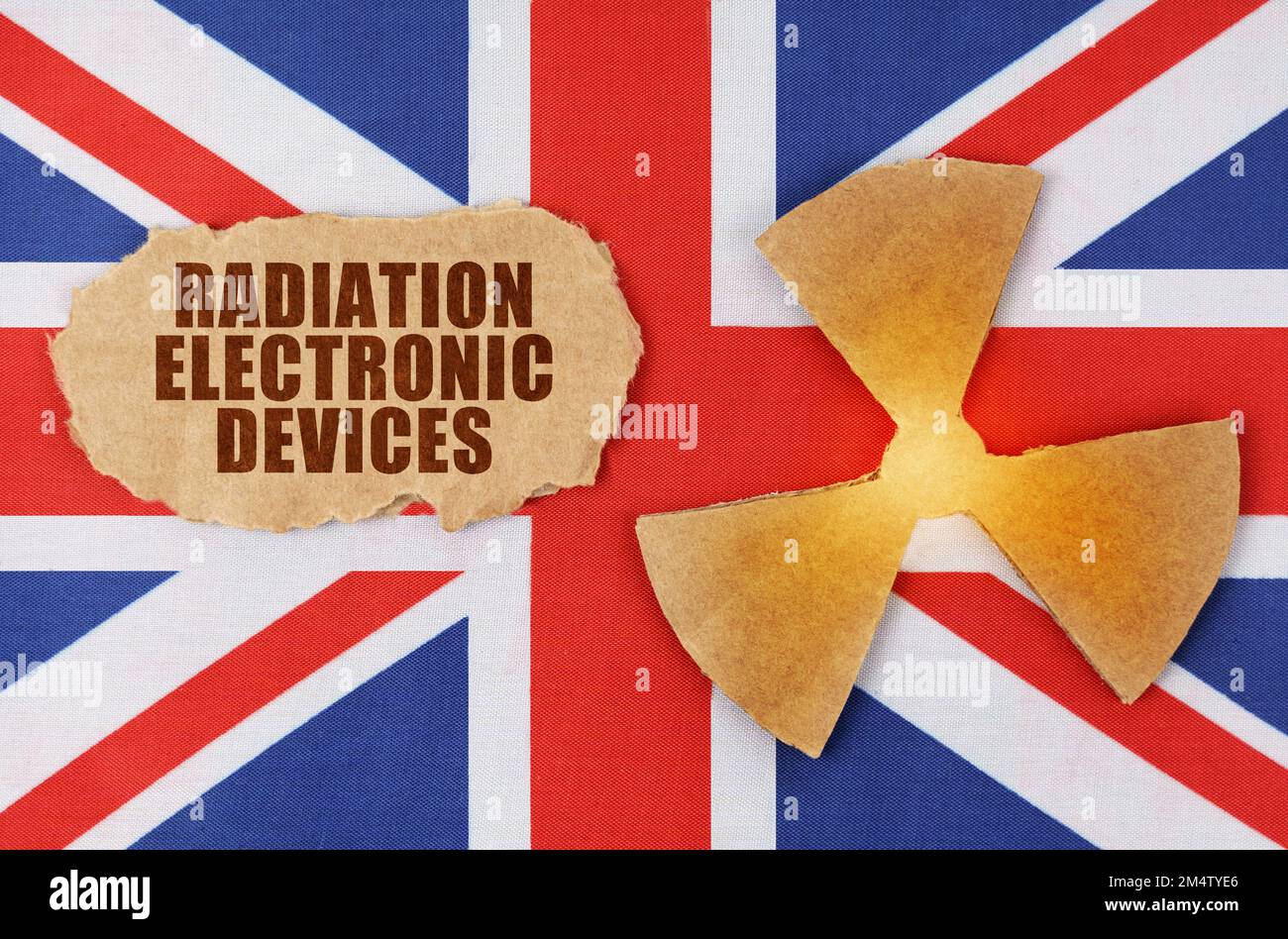 Industry and radiation concept. On the flag of Great Britain, there is ...