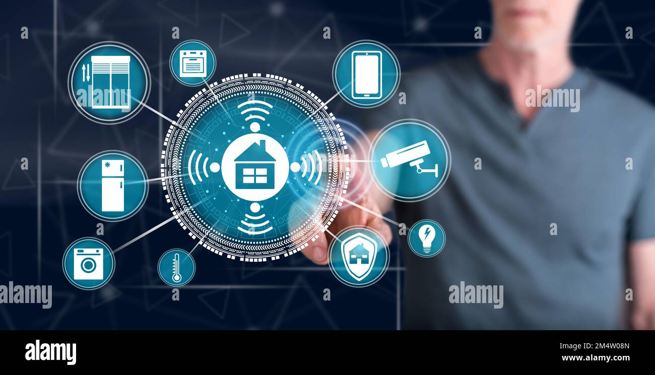 Man touching a smart home concept on a touch screen with his finger ...