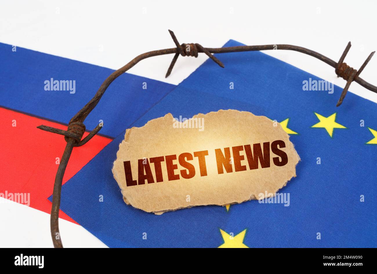 Political concept. On the flags of the European Union and Russia lies a ...
