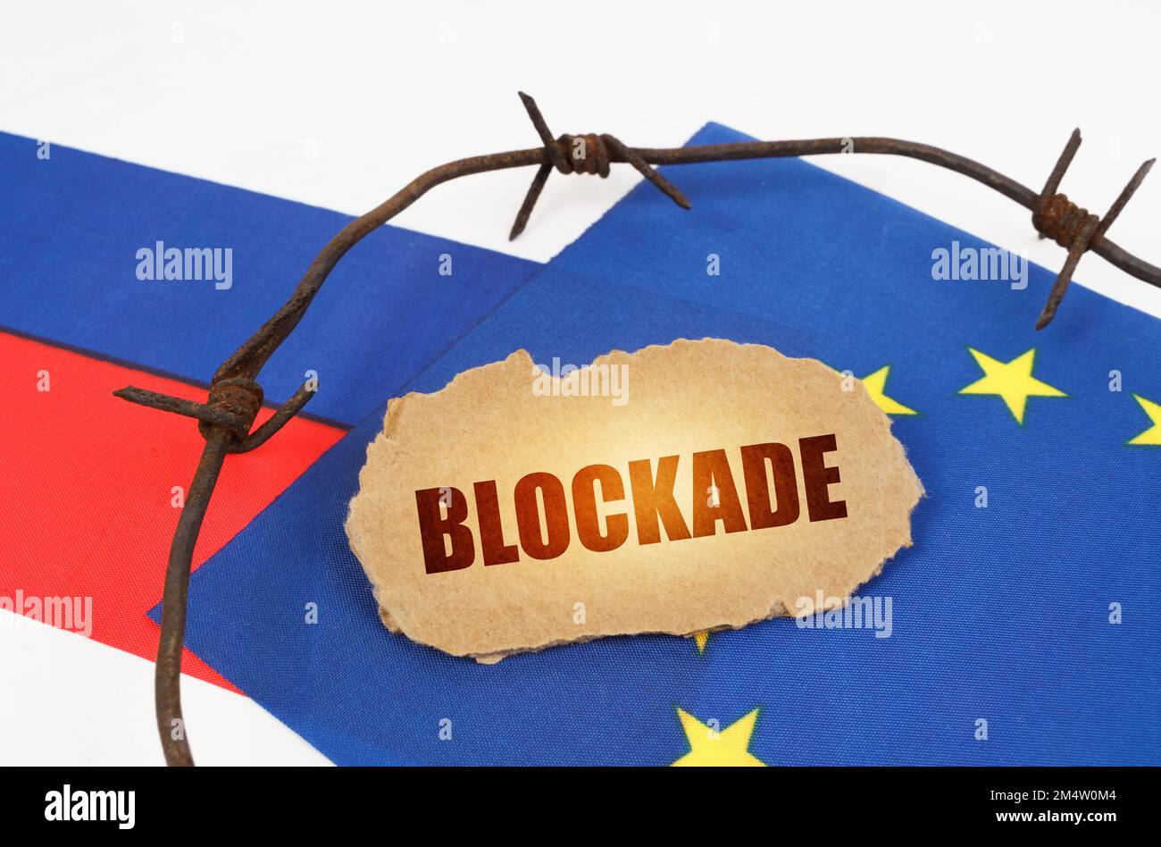 Political concept. On the flags of the European Union and Russia lies a ...