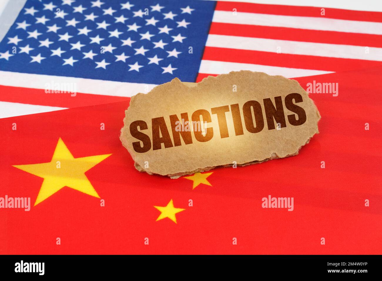 Political concept. On the flags of China and the United States lies a ...