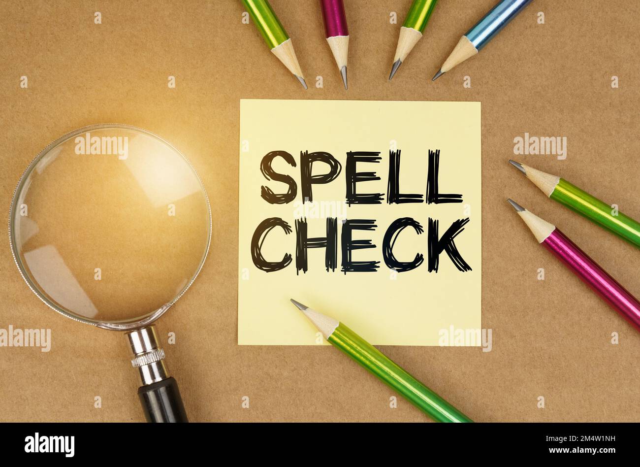 Education concept. On the table are pencils, a magnifying glass and a ...