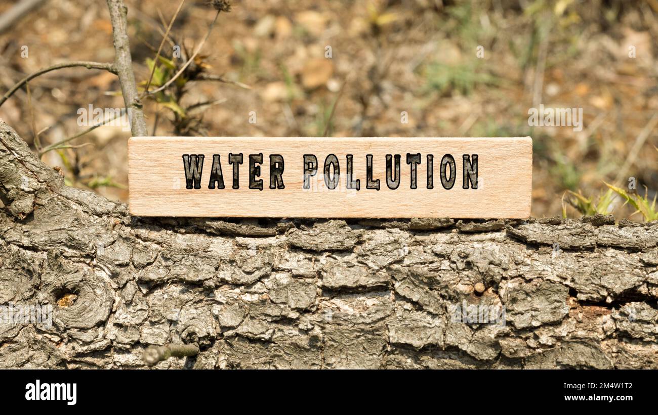 Water pollution word. Background log written on wooden frame. Nature ...