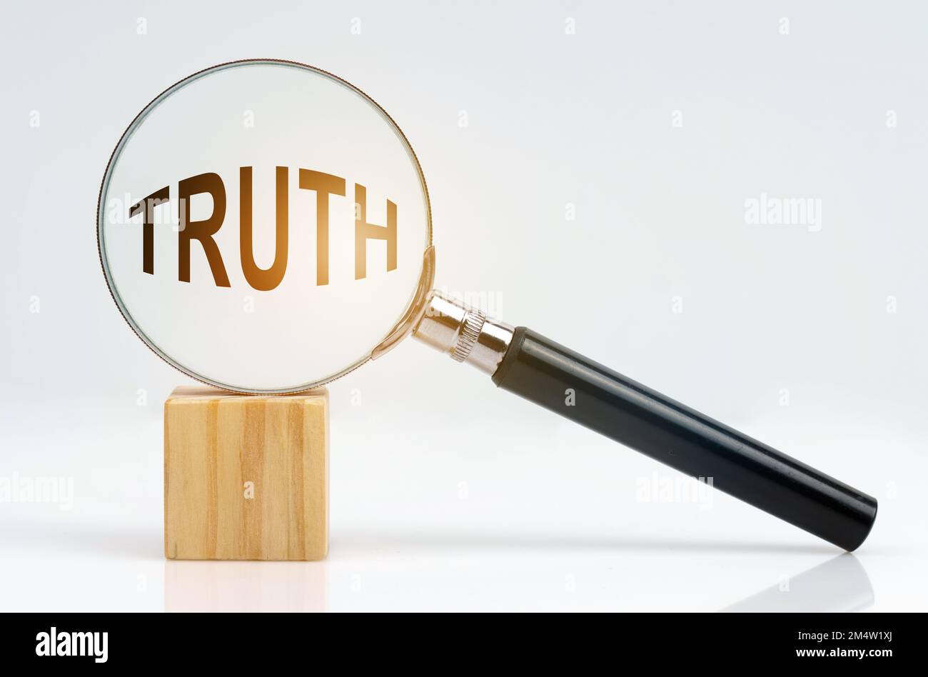 Truth word with magnifying glass hi-res stock photography and images ...