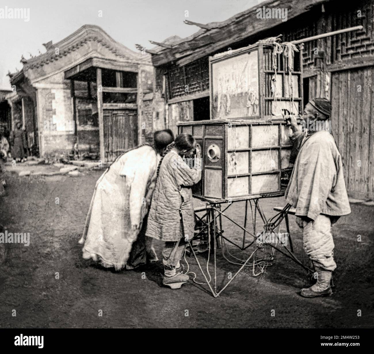 China Peking, Pechili province, China: a magic lantern show. Photograph ...