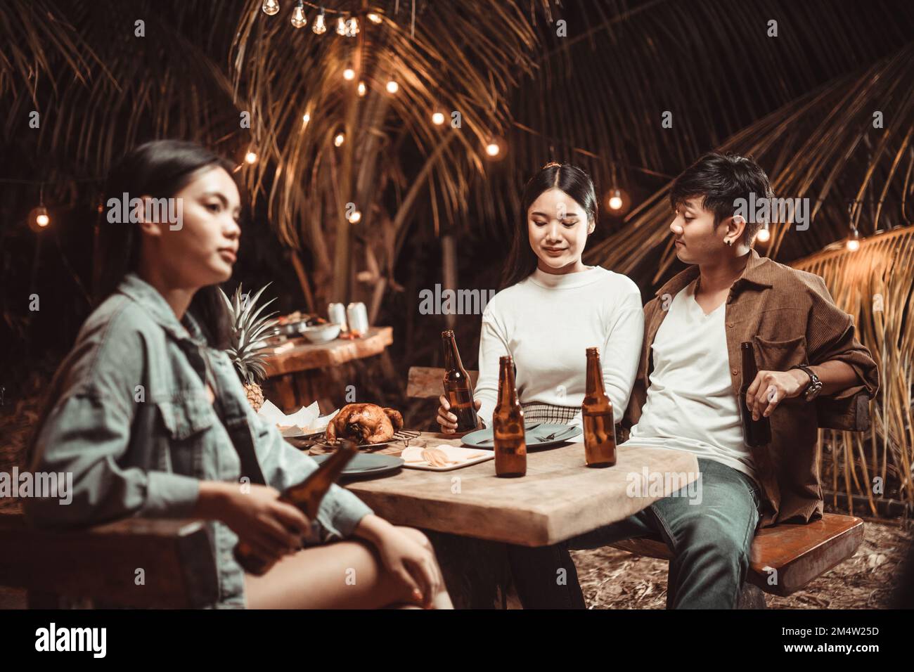 Couples and friends at a party Stock Photo - Alamy
