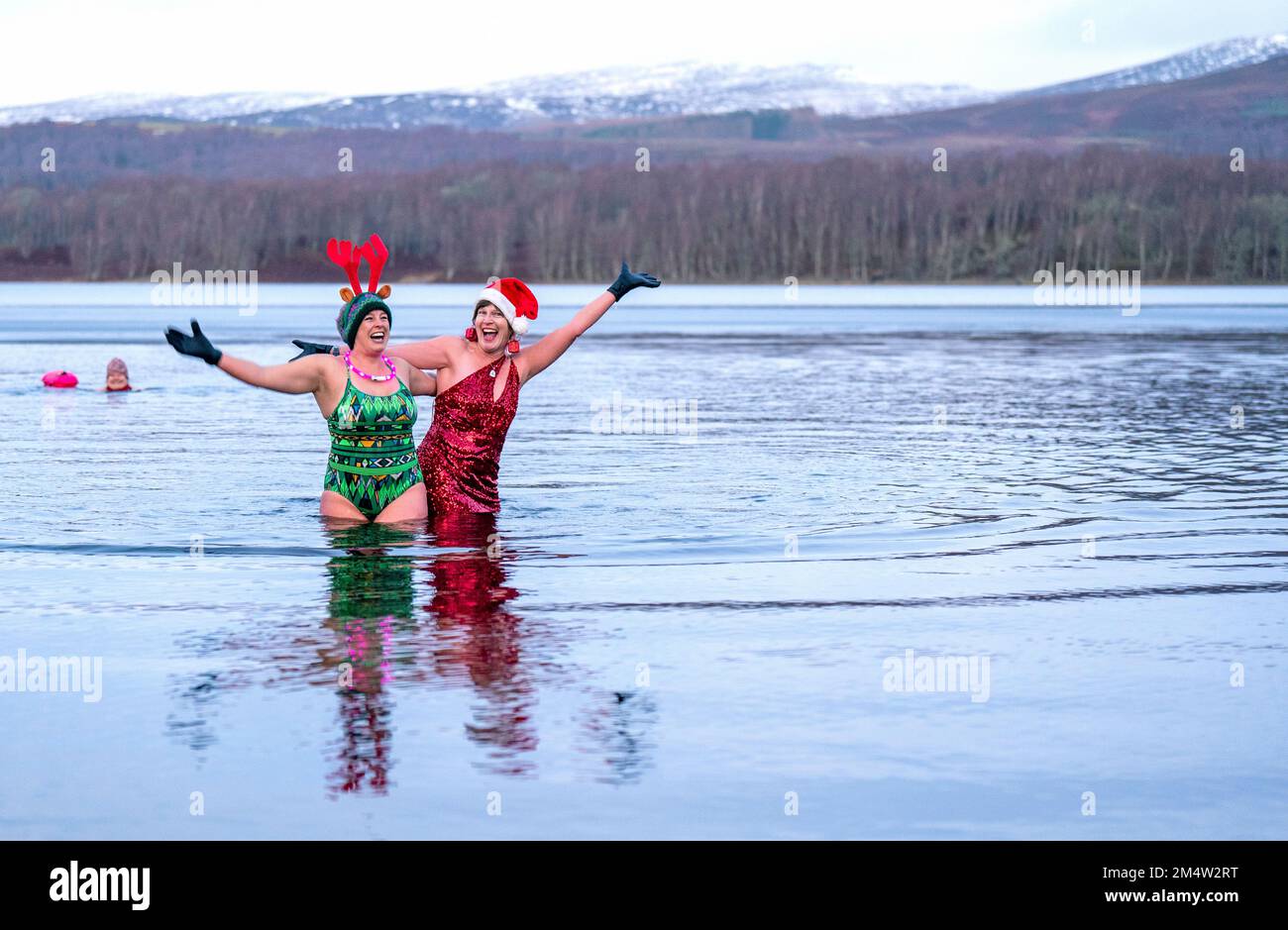 Members of the Loch Insh Dippers wild swim group take part in a ...