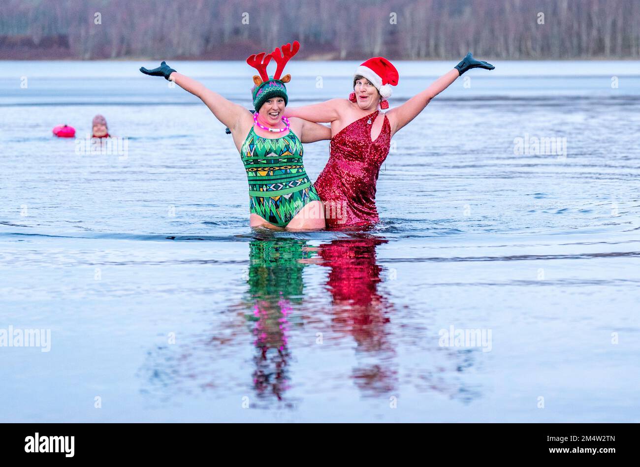 Members of the Loch Insh Dippers wild swim group take part in a ...