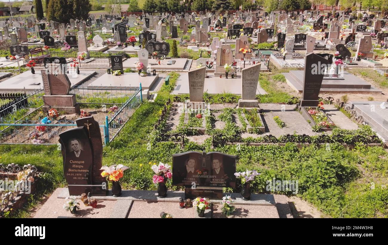 Drone flight over the graves of the cemetery Stock Photo - Alamy