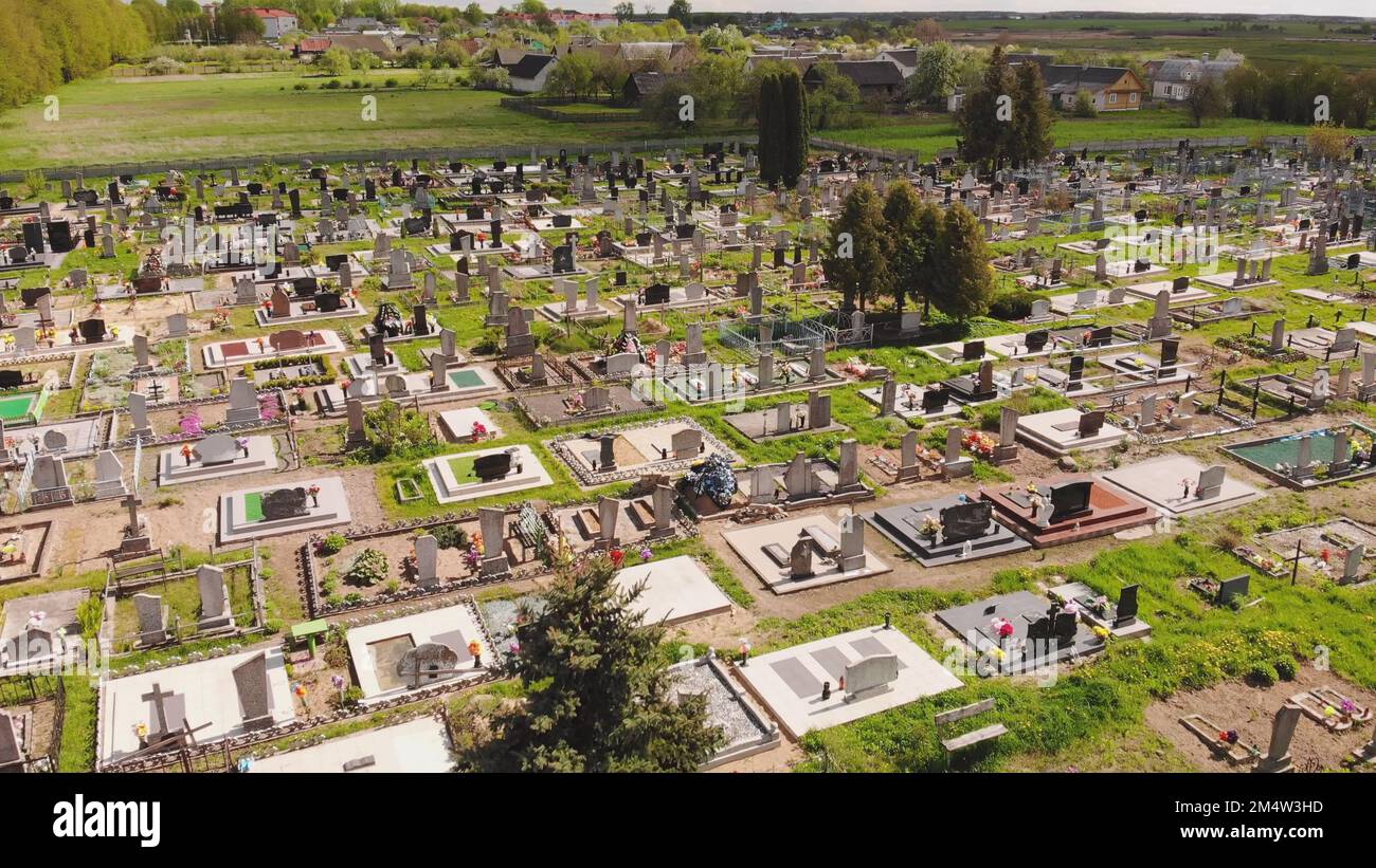Drone flight over the graves of the cemetery Stock Photo - Alamy
