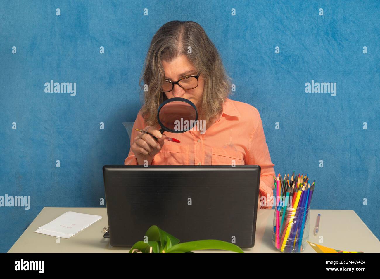 A female thinking and concentrated with laptop computer working from ...