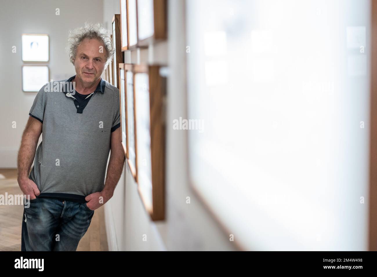 Author and illustrator Charlie Mackesy with his exhibition 'Look How ...