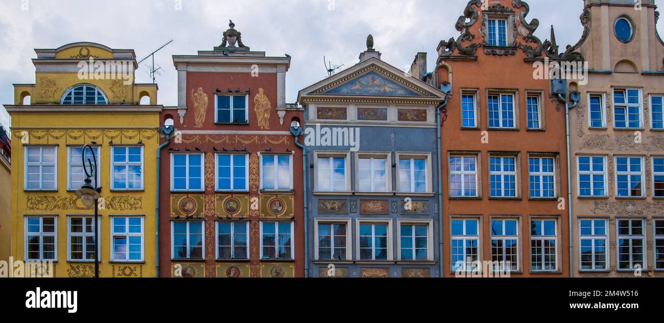 Facade of beautiful typical colorful houses buildings in old historical ...