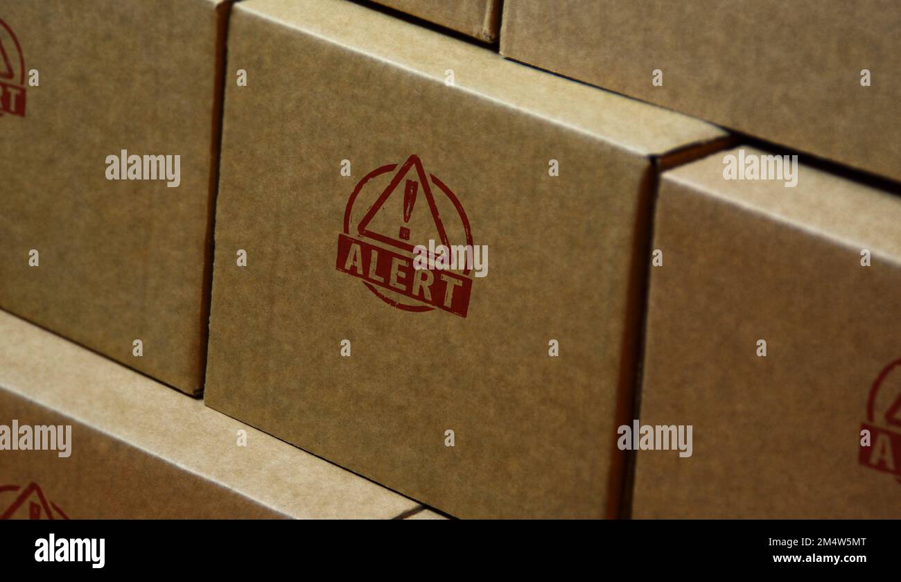 Alert stamp printed on cardboard box. Danger alarm, security warning ...