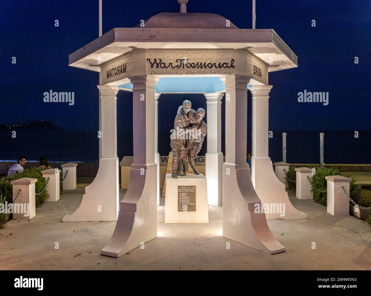 Floodlit War Memorial statue of two wounded soldiers commemorating ...